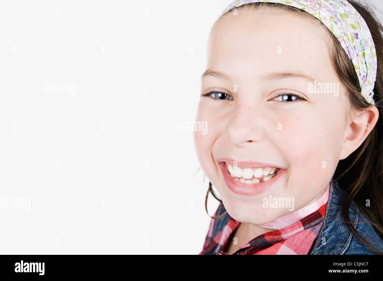 Studio portrait of girl (8-9 Stock Photo - Alamy
