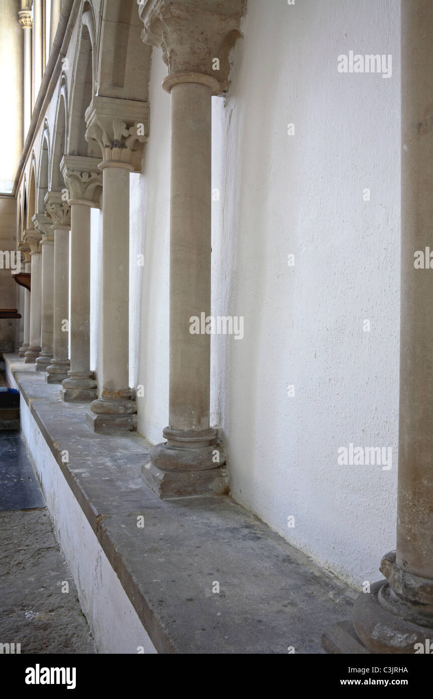 A colonnade with arches by the chancel wall of the Church of St Mary at ...