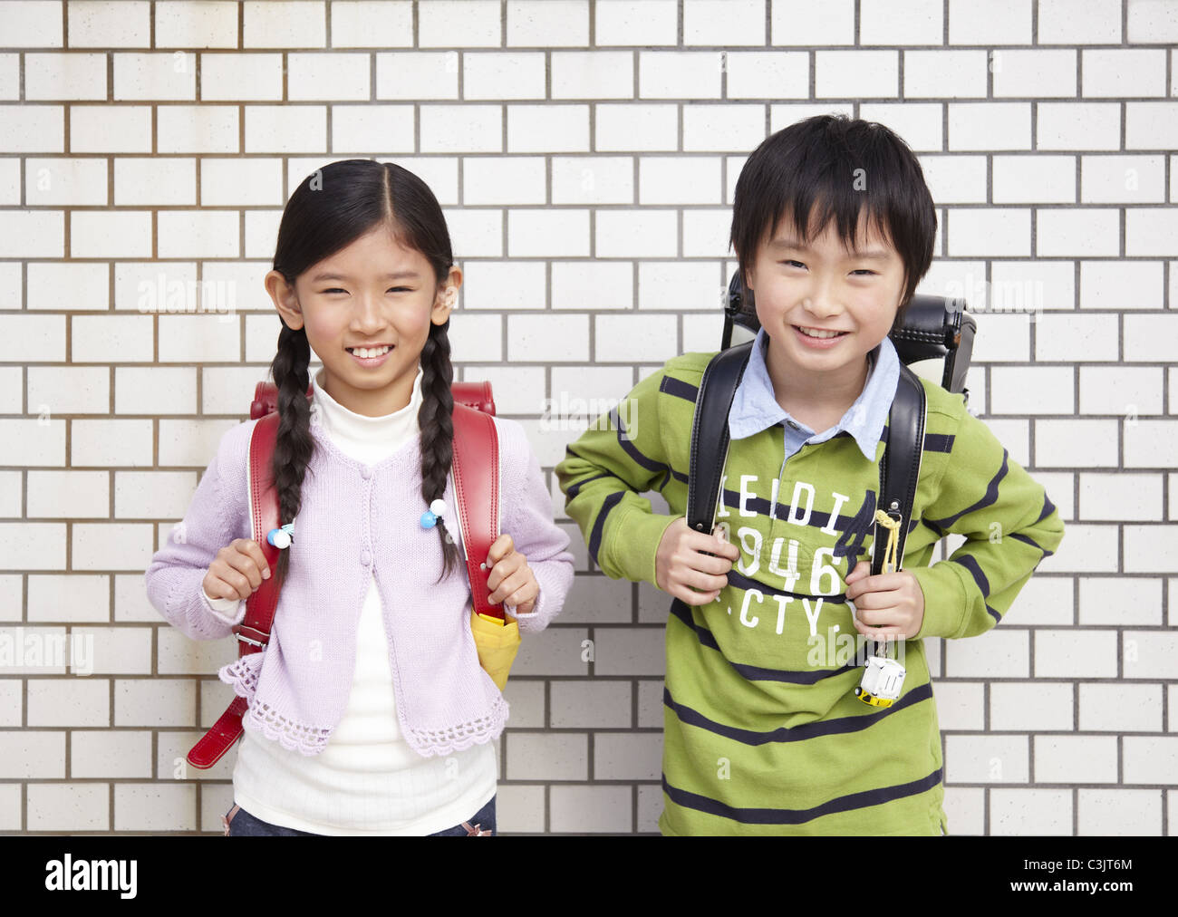 Elementary school kids smiling Stock Photo - Alamy