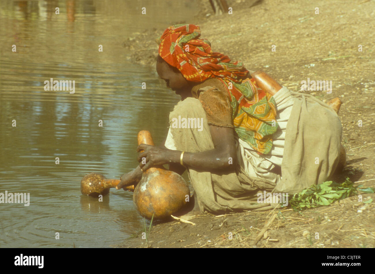 Ethiopia women fetching water hi-res stock photography and images - Alamy