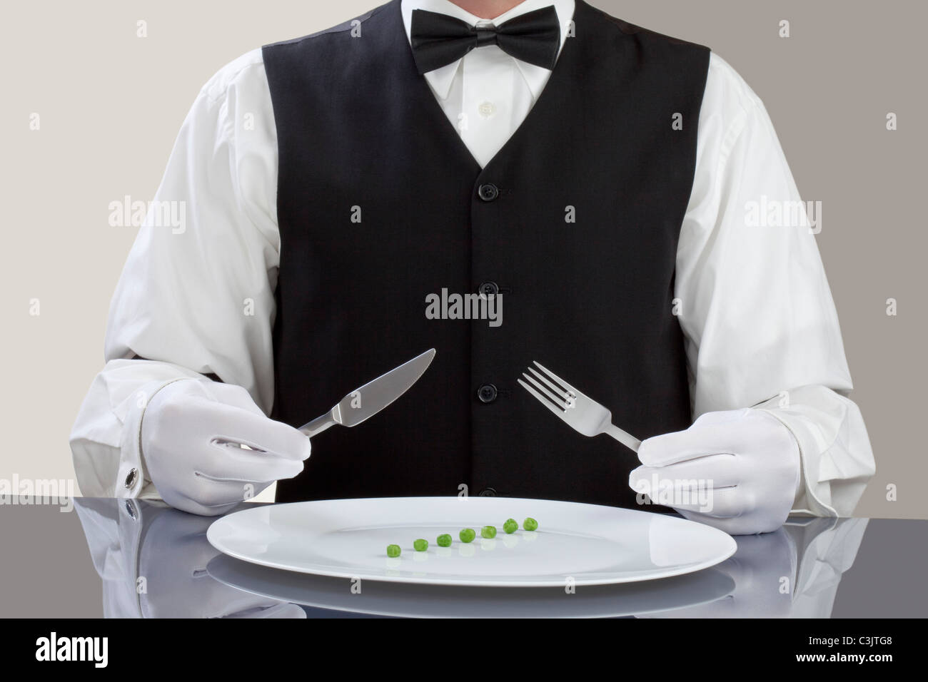 Man with diet meal in plate Stock Photo - Alamy