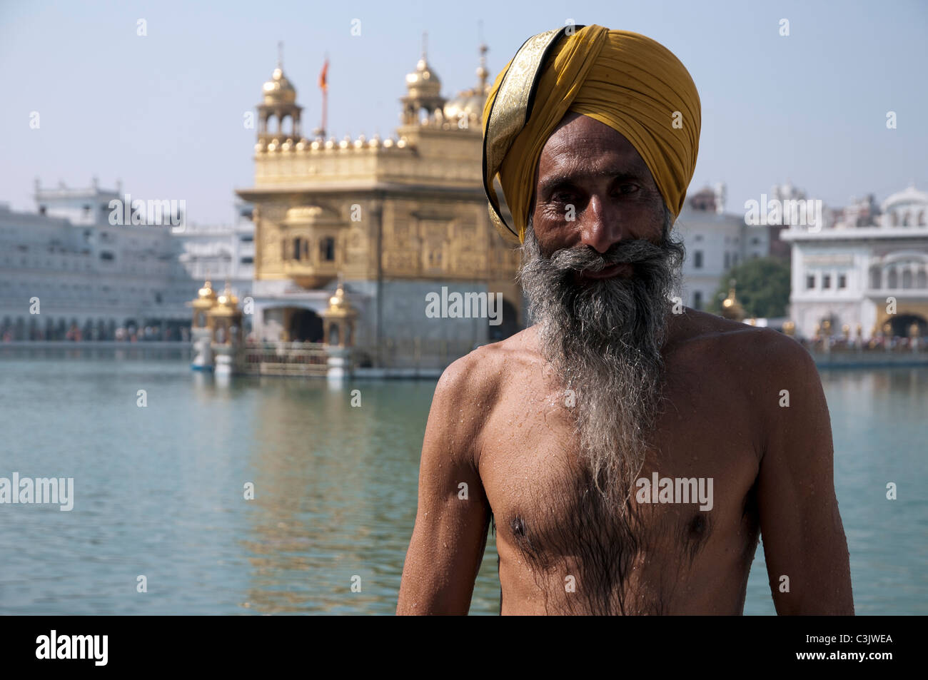 Portrait of an Indian SIkh in Amritsar, in front of the famous Golden ...