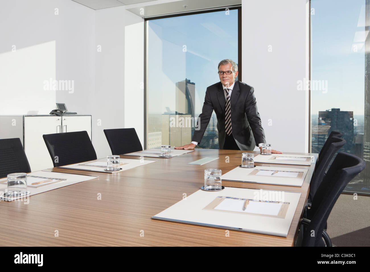 Germany, Frankfurt, Businessman in conference room Stock Photo - Alamy