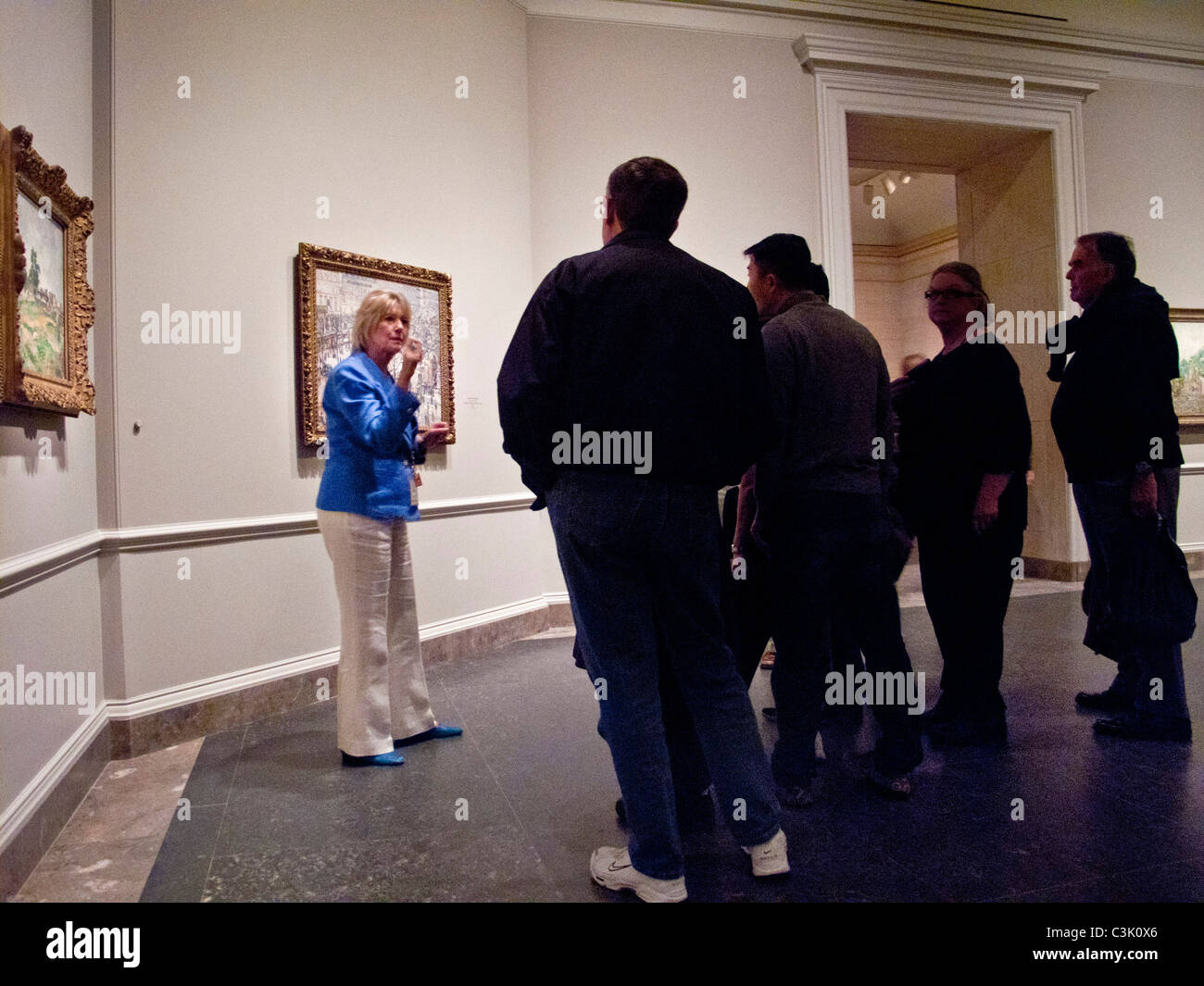 Docent leading tour museum hi-res stock photography and images - Alamy