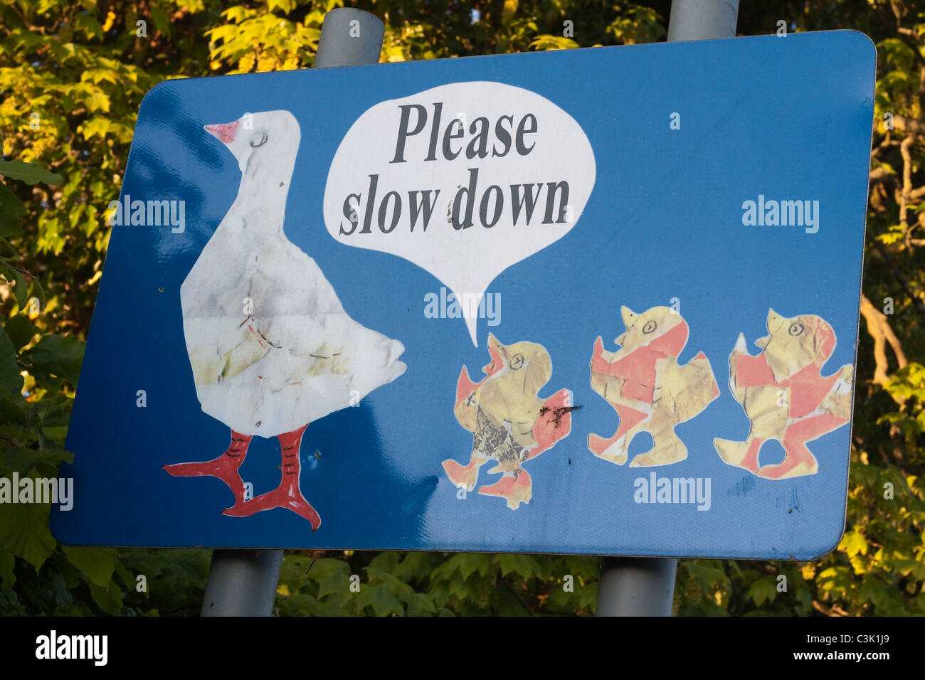 Slow down sign hi-res stock photography and images - Alamy