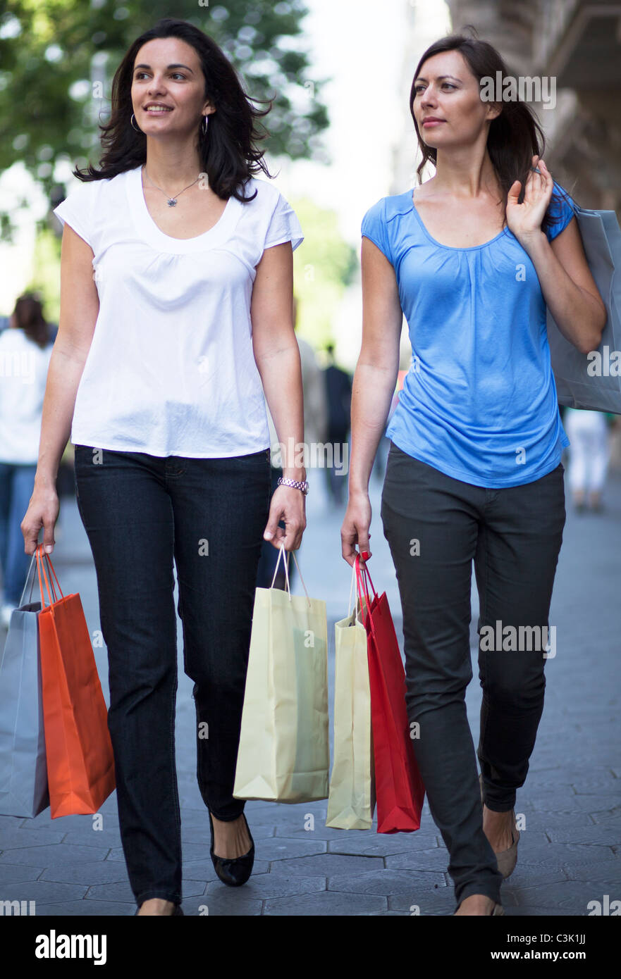 Two woman shopping Stock Photo - Alamy