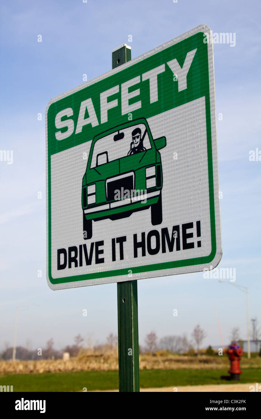Safety drive it home sign Stock Photo - Alamy