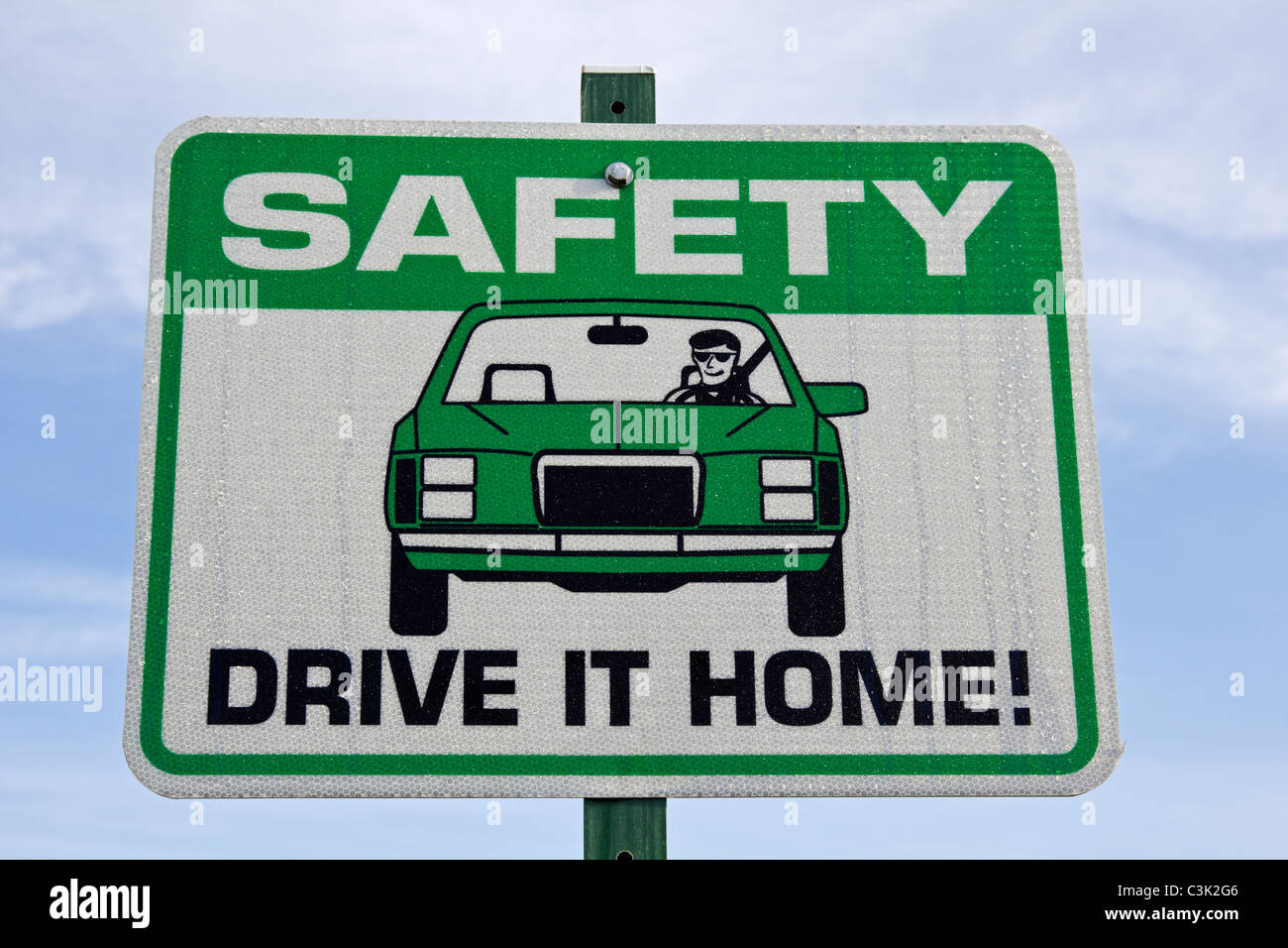 Safety drive it home sign Stock Photo - Alamy