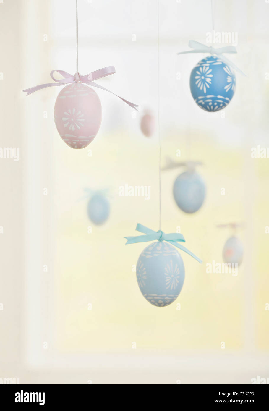 Hanging by string hi-res stock photography and images - Alamy