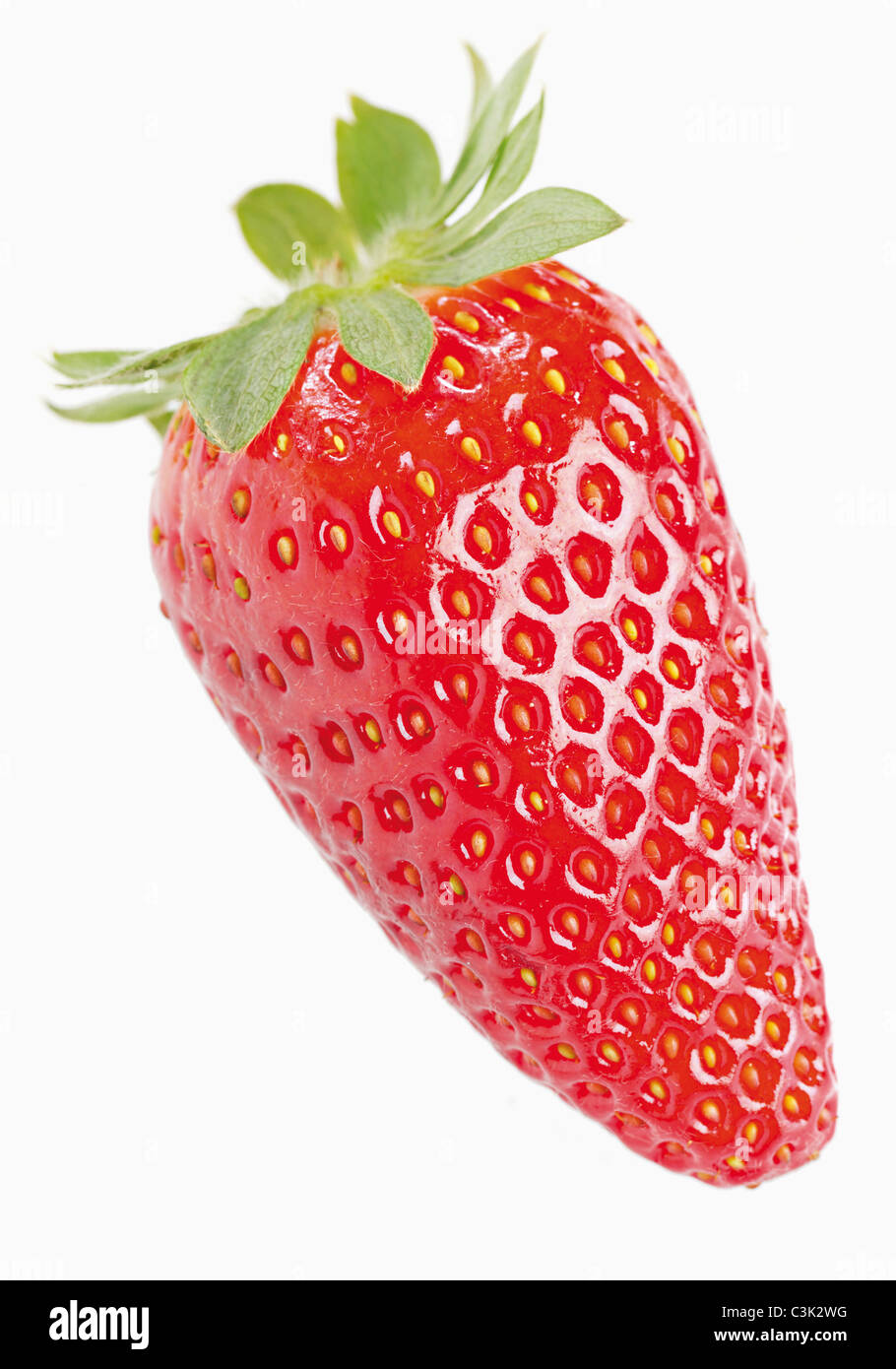 Strawberry against white background, close up Stock Photo - Alamy