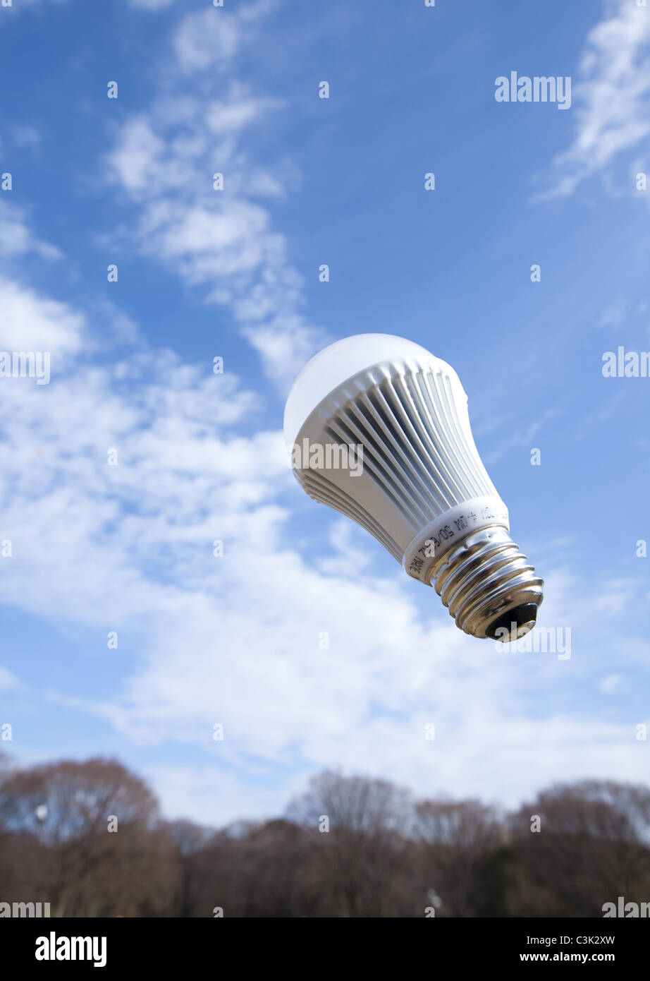 LED bulb and blue sky Stock Photo - Alamy
