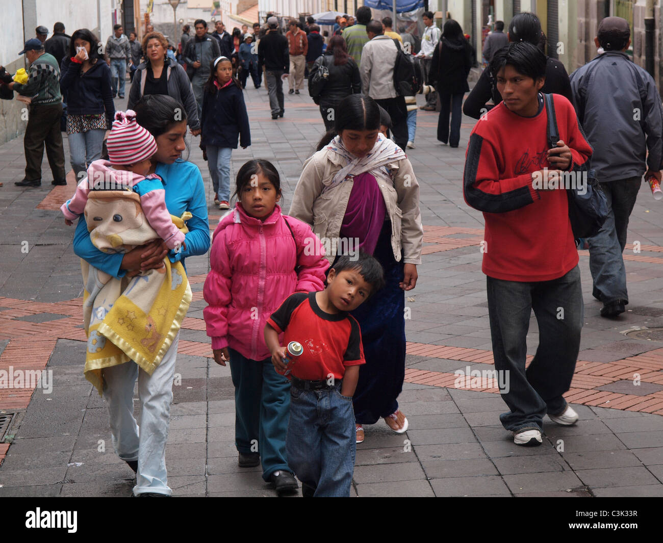Ecuadorean family walking in city centre Quito Ecuador Stock Photo - Alamy