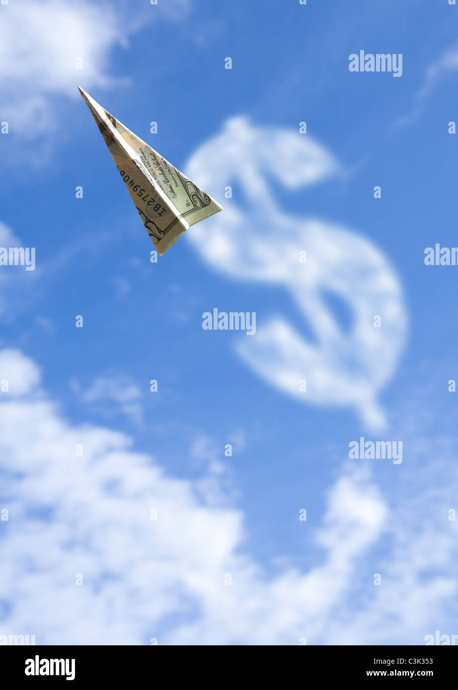 Dollar bill paper plane and dollar sign cloud Stock Photo - Alamy