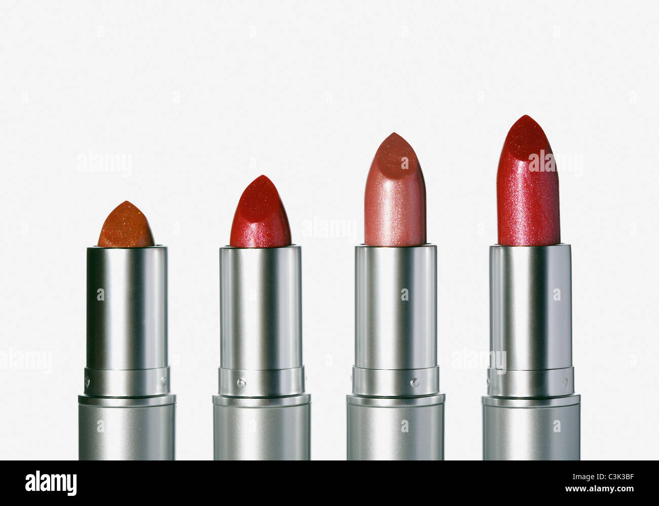 Row of red lipsticks hi-res stock photography and images - Alamy