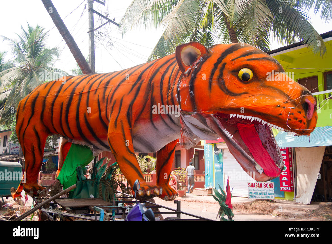 A large pappier mache' model of a tiger fabricated on a float for the ...