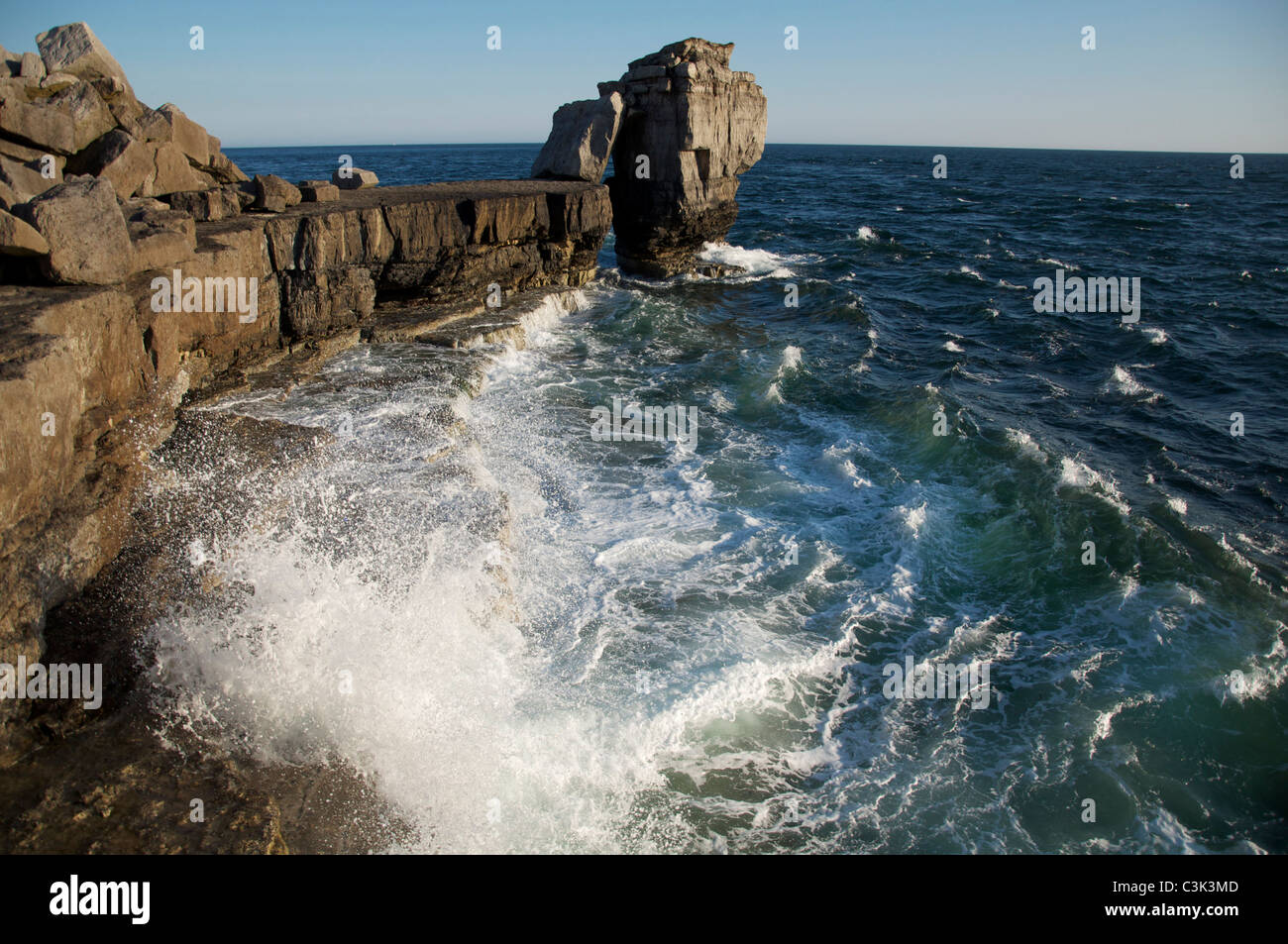 Pulpit Rock in a stormy sea. This massive limestone stack stands just ...