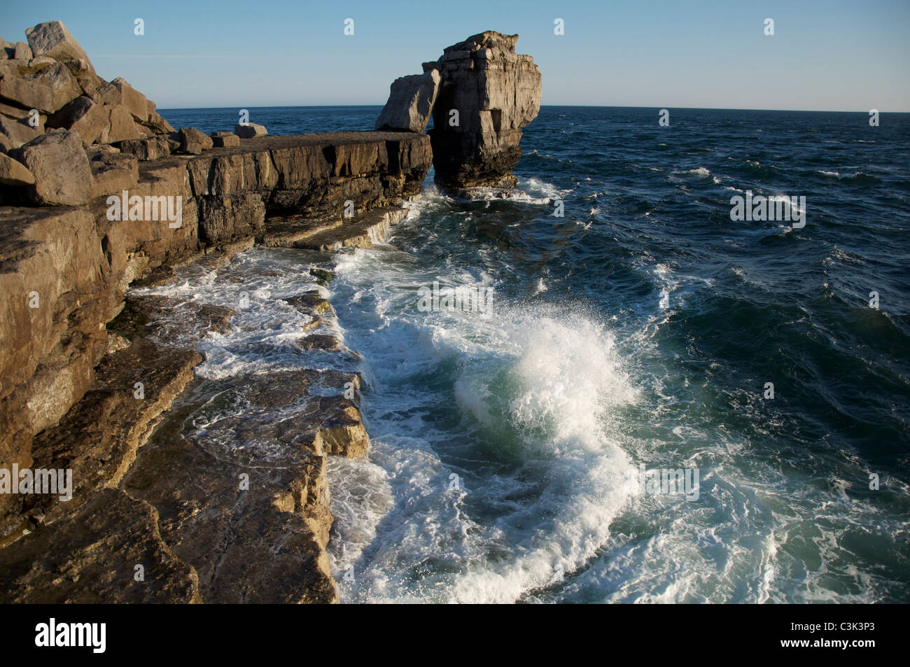 Pulpit Rock in a stormy sea. This massive limestone stack stands just ...