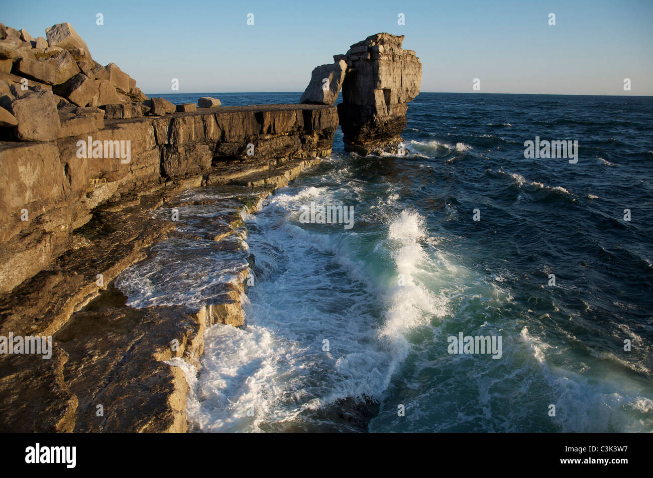 Pulpit Rock in a stormy sea. This massive limestone stack stands just ...