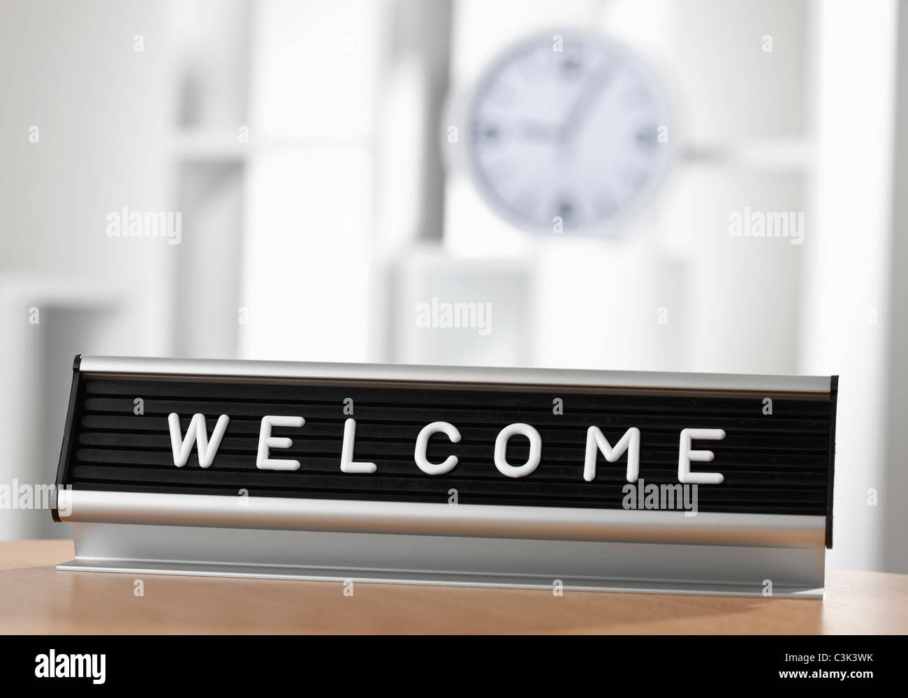 Welcome sign in office, close up Stock Photo - Alamy