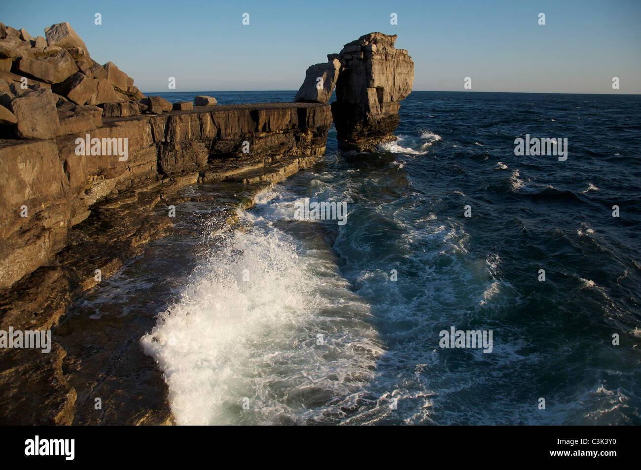 Pulpit Rock in a stormy sea. This massive limestone stack stands just ...