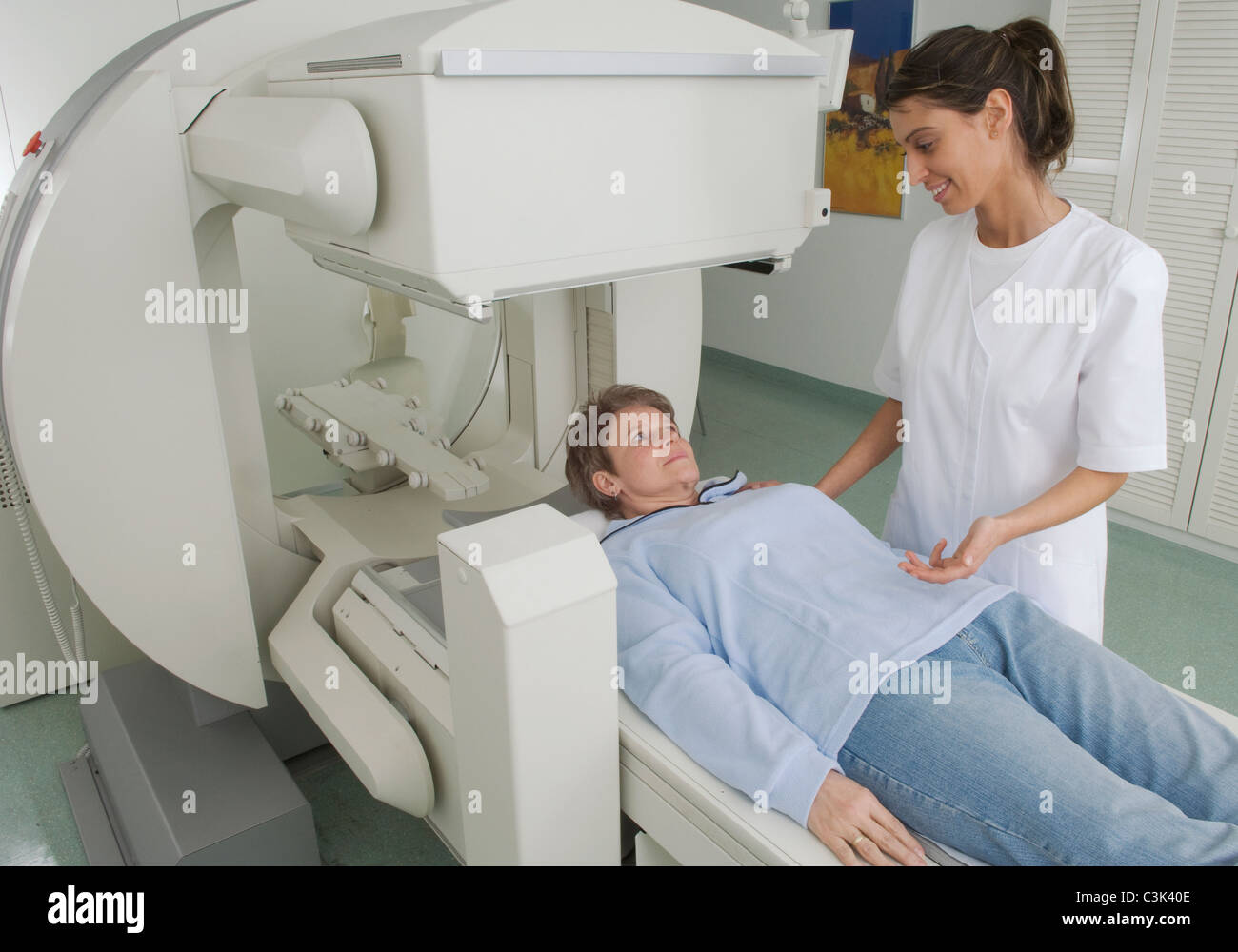 Germany, Nuremberg, Doctor doing medical examination of patient Stock ...
