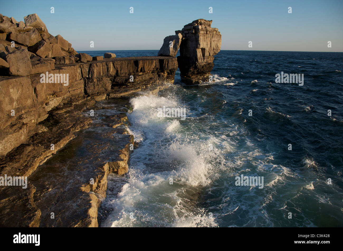 Pulpit Rock in a stormy sea. This massive limestone stack stands just ...