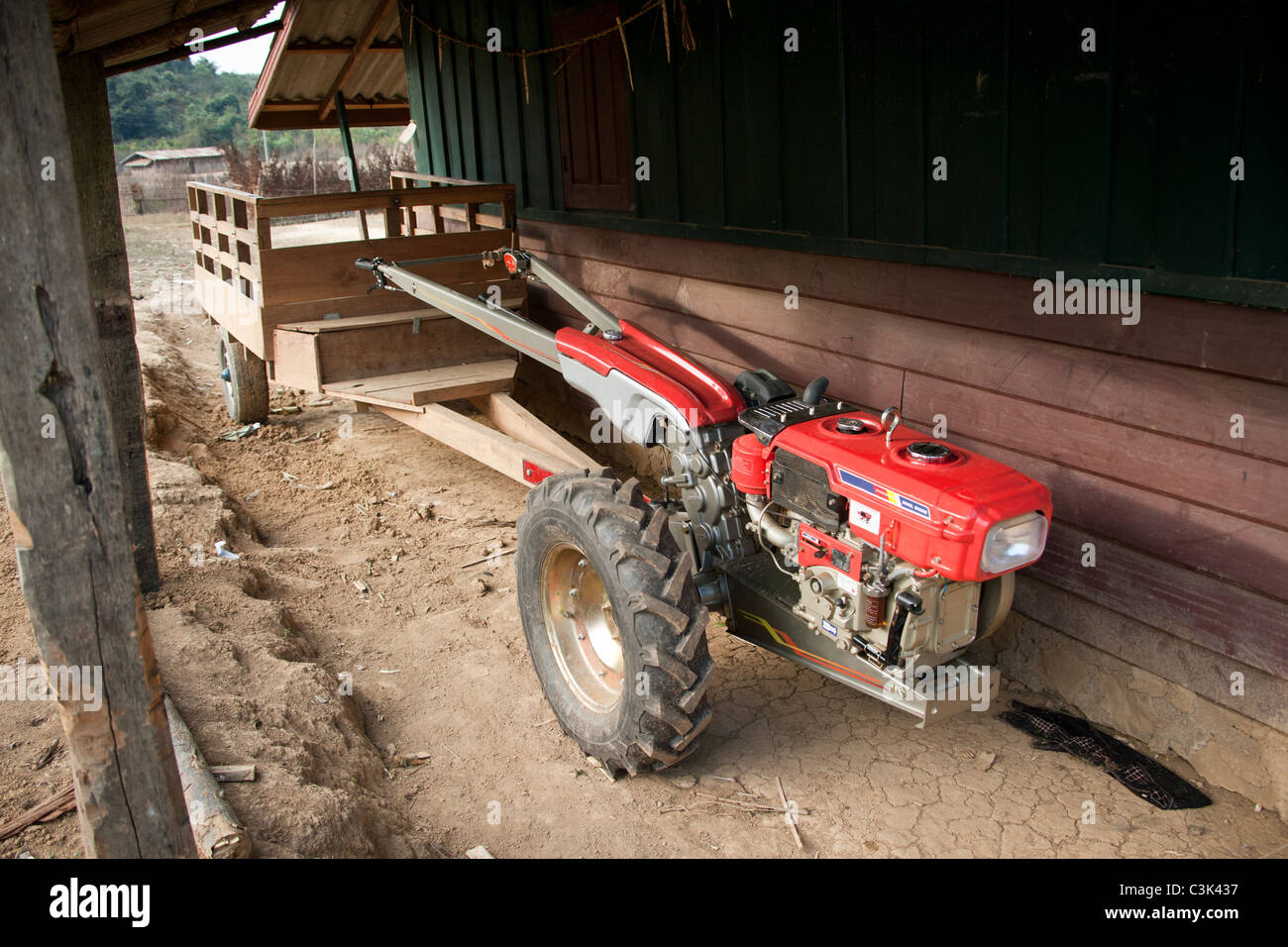 Two wheel tractor, Tok-tok, with trailer in rural Laos Stock Photo - Alamy