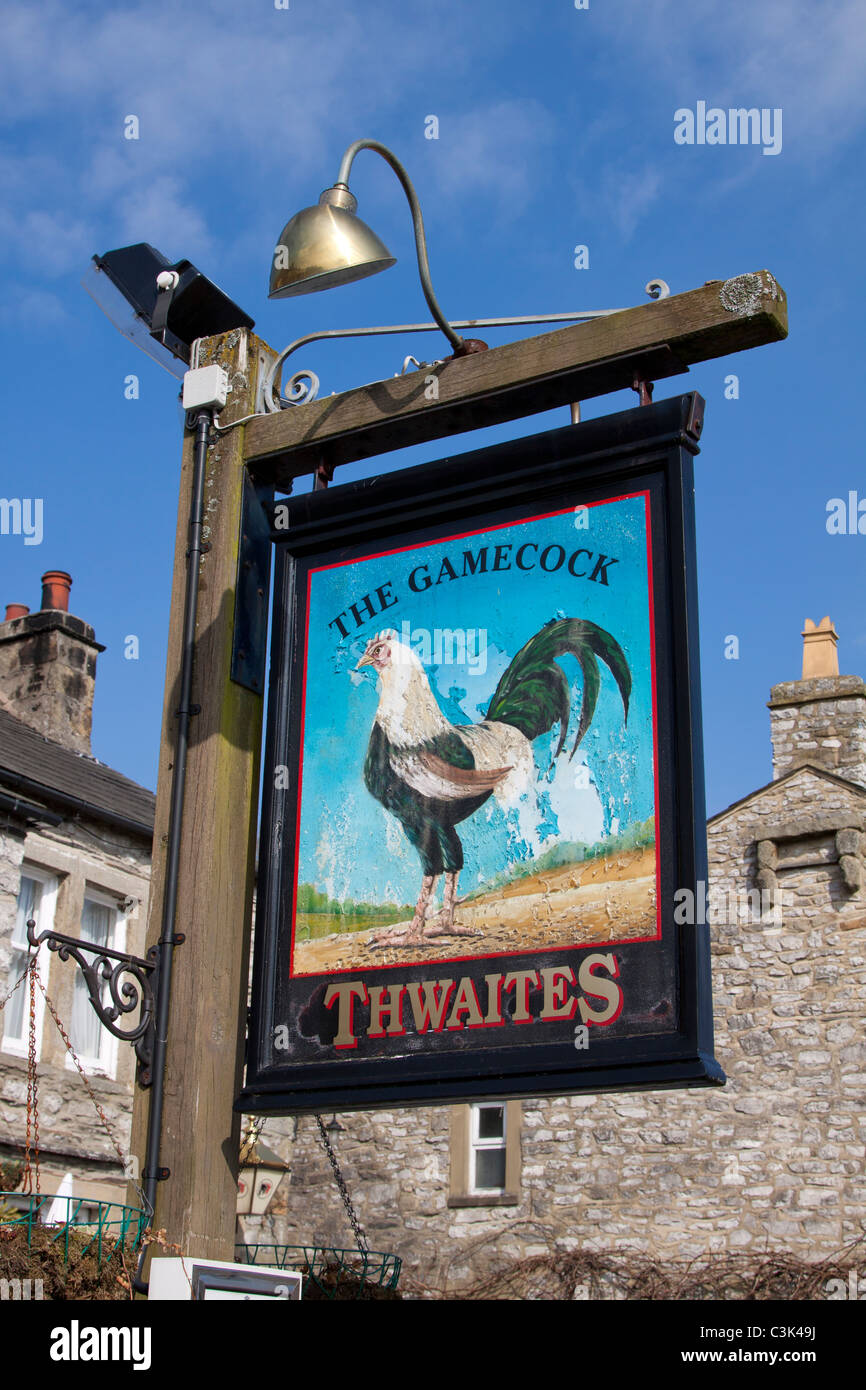 The Gamecock public house sign, in the village of Austwick, part of the ...