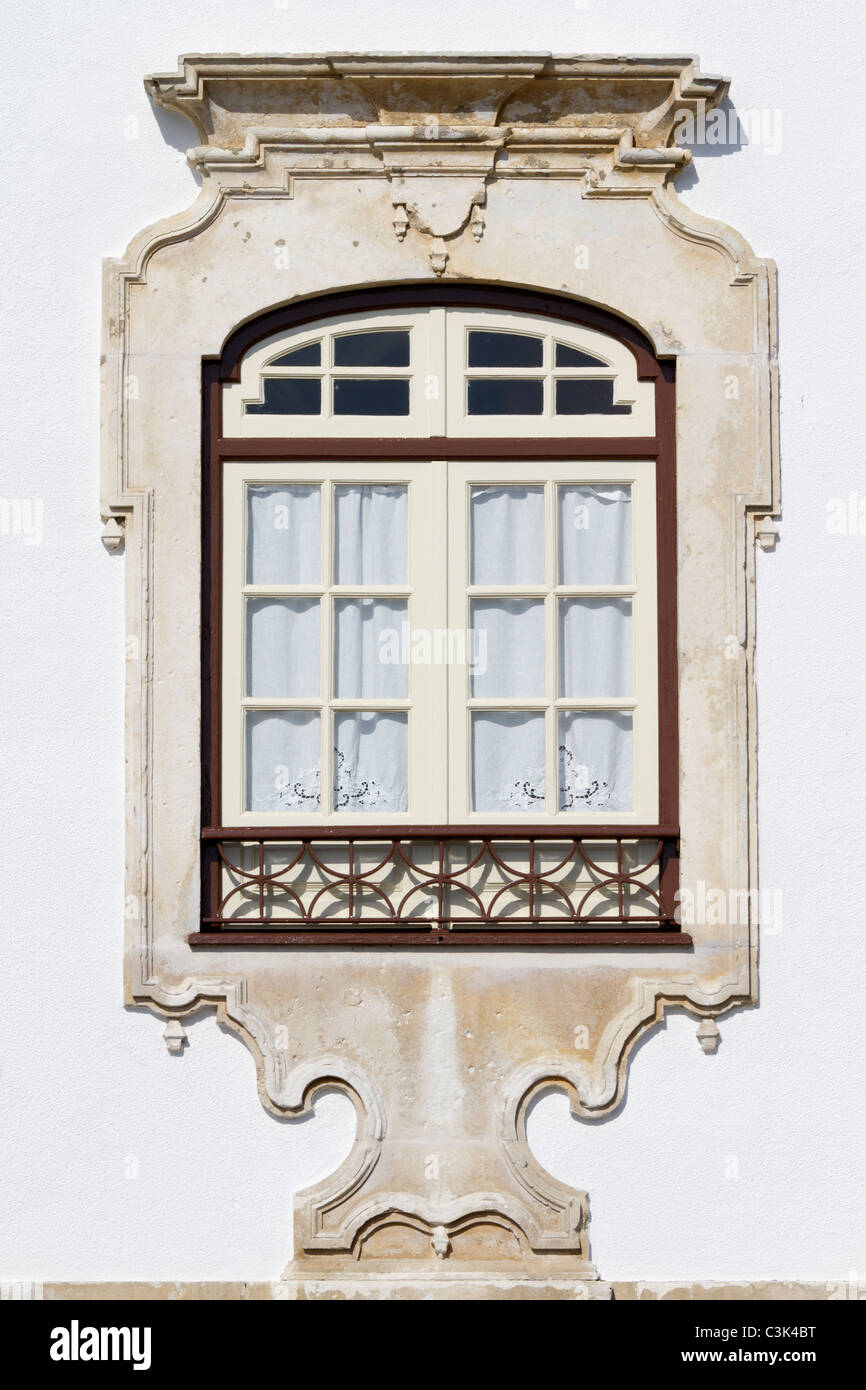 Ornamented stone framed window Stock Photo - Alamy