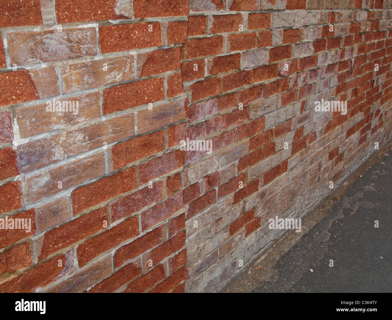 A frost damaged brick wall Stock Photo - Alamy