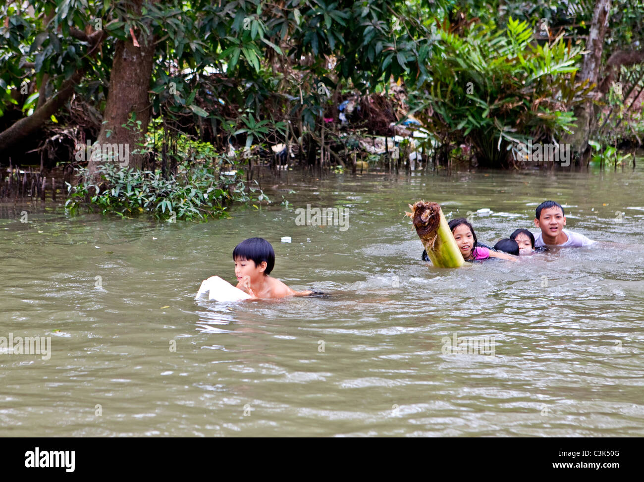 People swimming, Mekong River Delta, Vietnam Stock Photo - Alamy