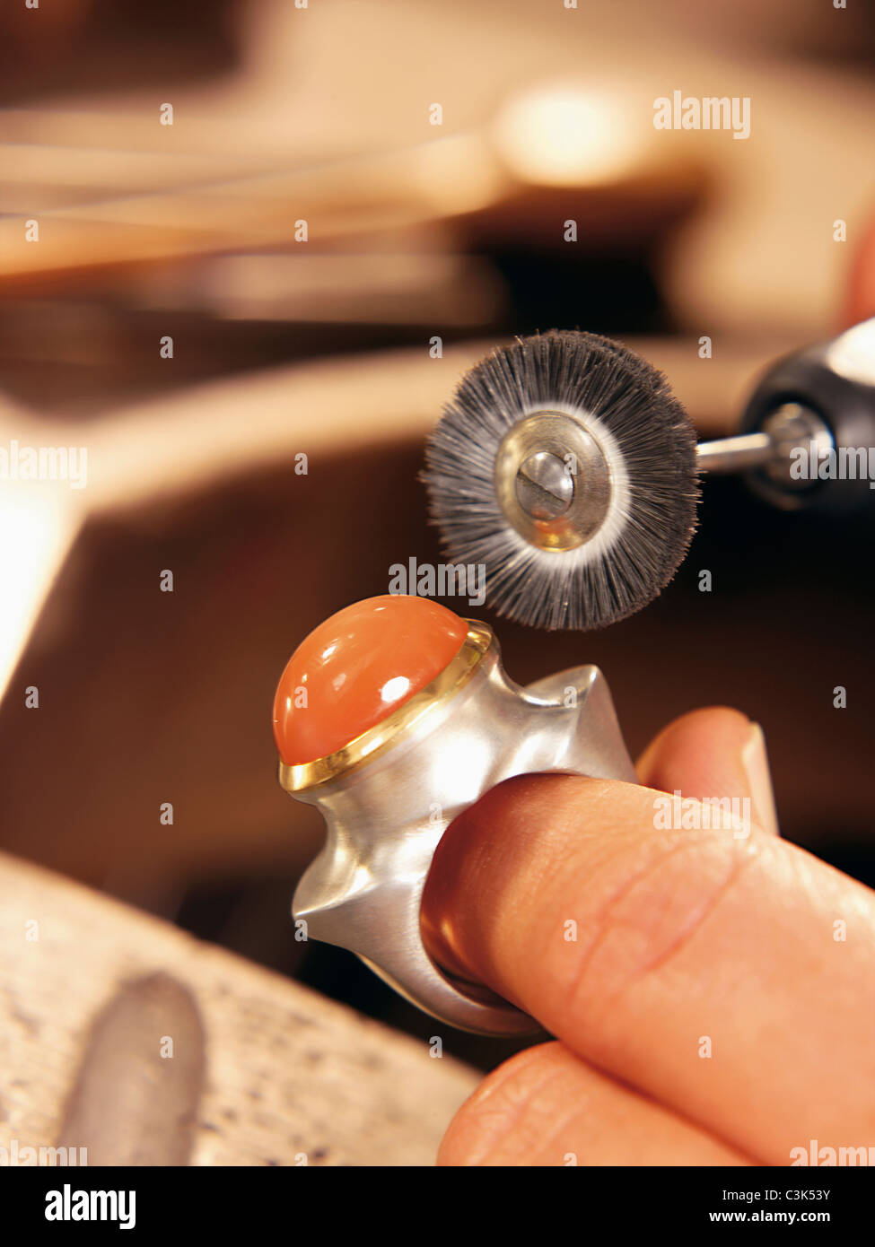 Woman polishing jewellery hi-res stock photography and images - Alamy