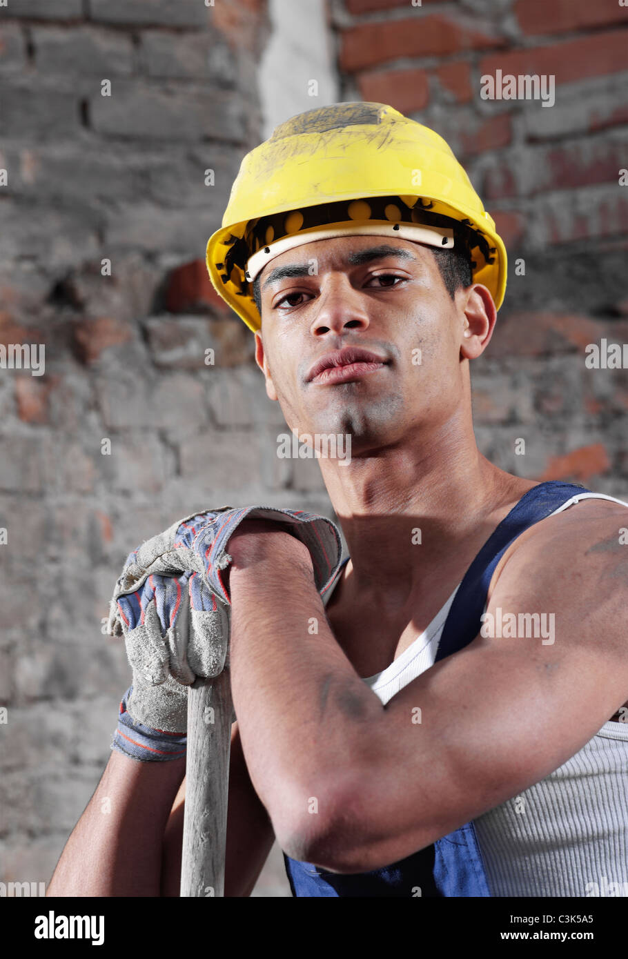 Germany, Construction worker with shovel, portrait Stock Photo - Alamy