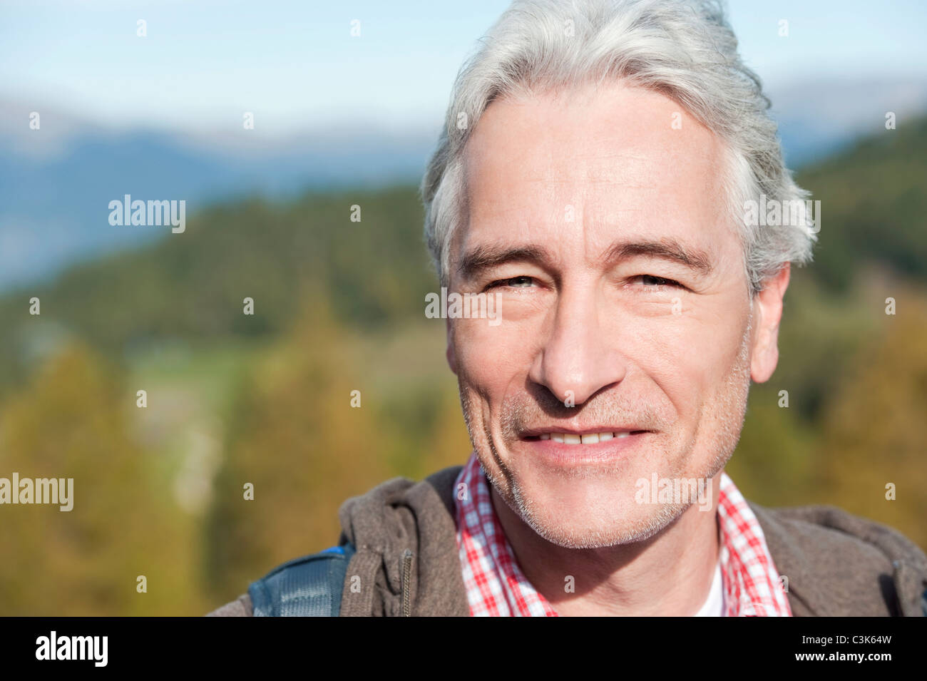 Italy, South Tyrol, Mature man smiling, portrait Stock Photo - Alamy