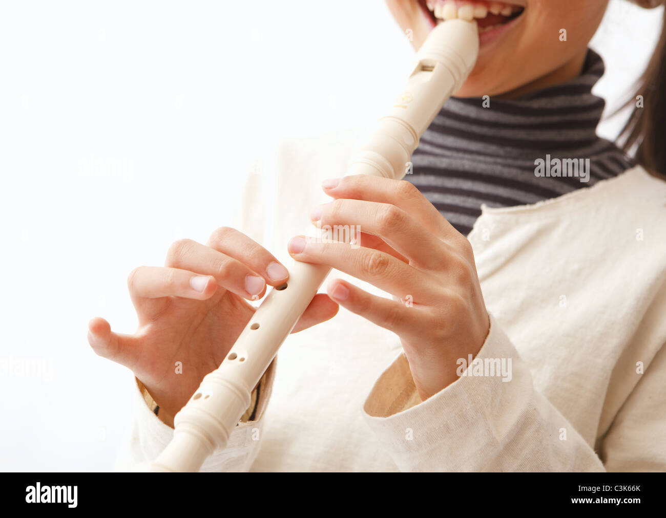 Girl playing recorder hi-res stock photography and images - Alamy