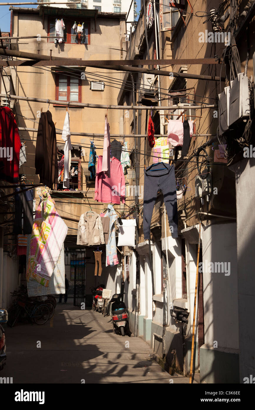 Washing dries over a characterful back street in Shanghai, China Stock ...
