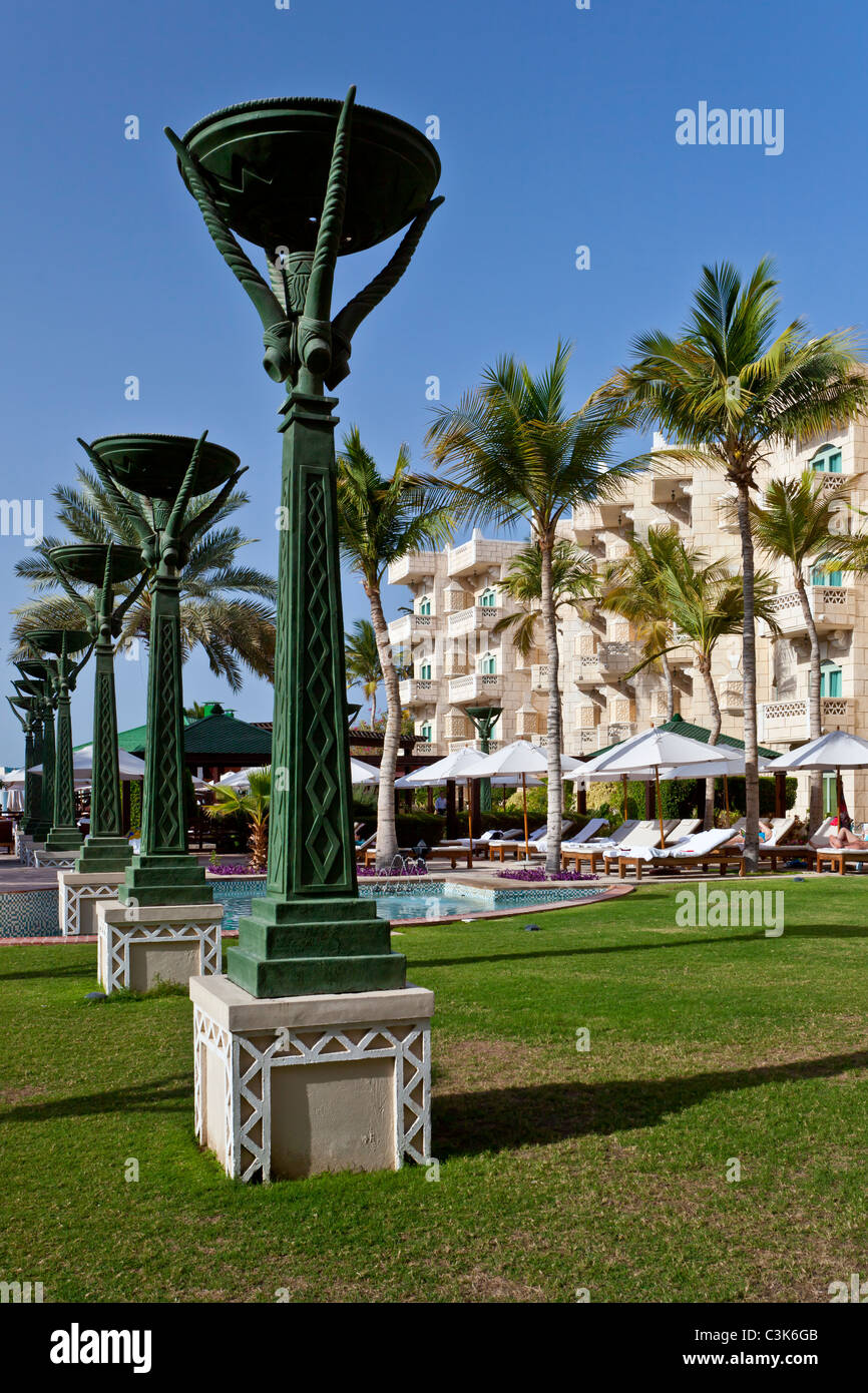 The exterior patio and pool area of the Grand Hyatt Hotel in Muscat ...