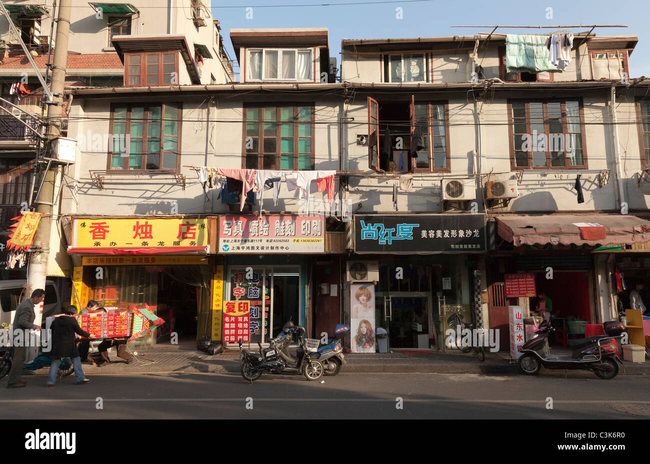 Characterful shop fronts in Shanghai, China Stock Photo - Alamy