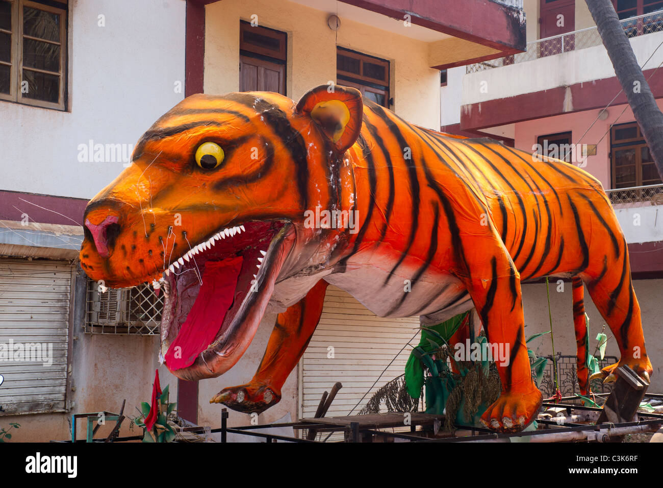 A large pappier mache' model of a tiger fabricated on a float for the ...
