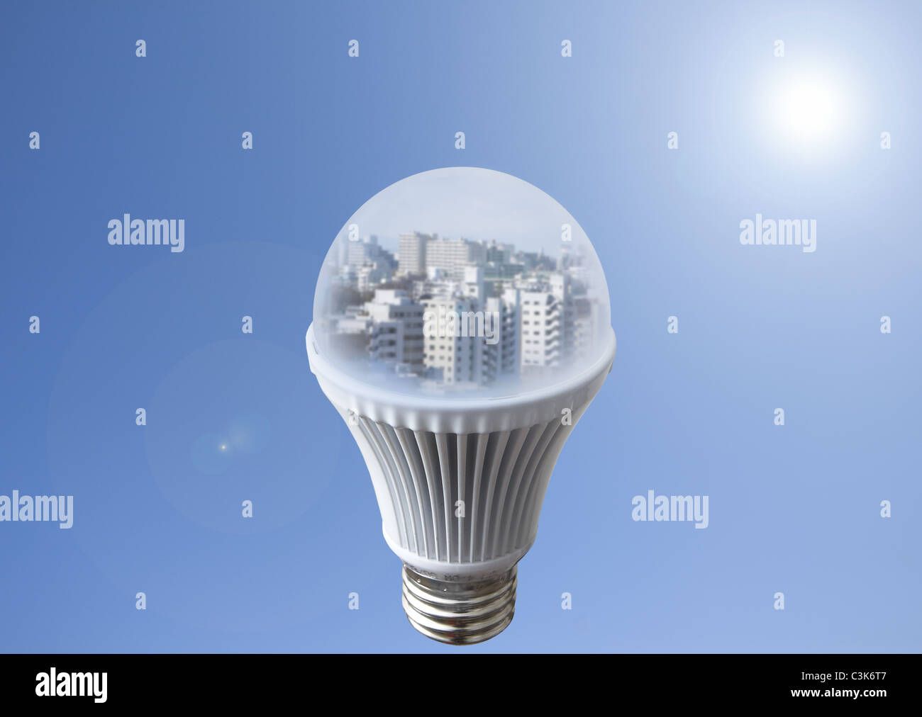 LED bulb with town inside Stock Photo - Alamy