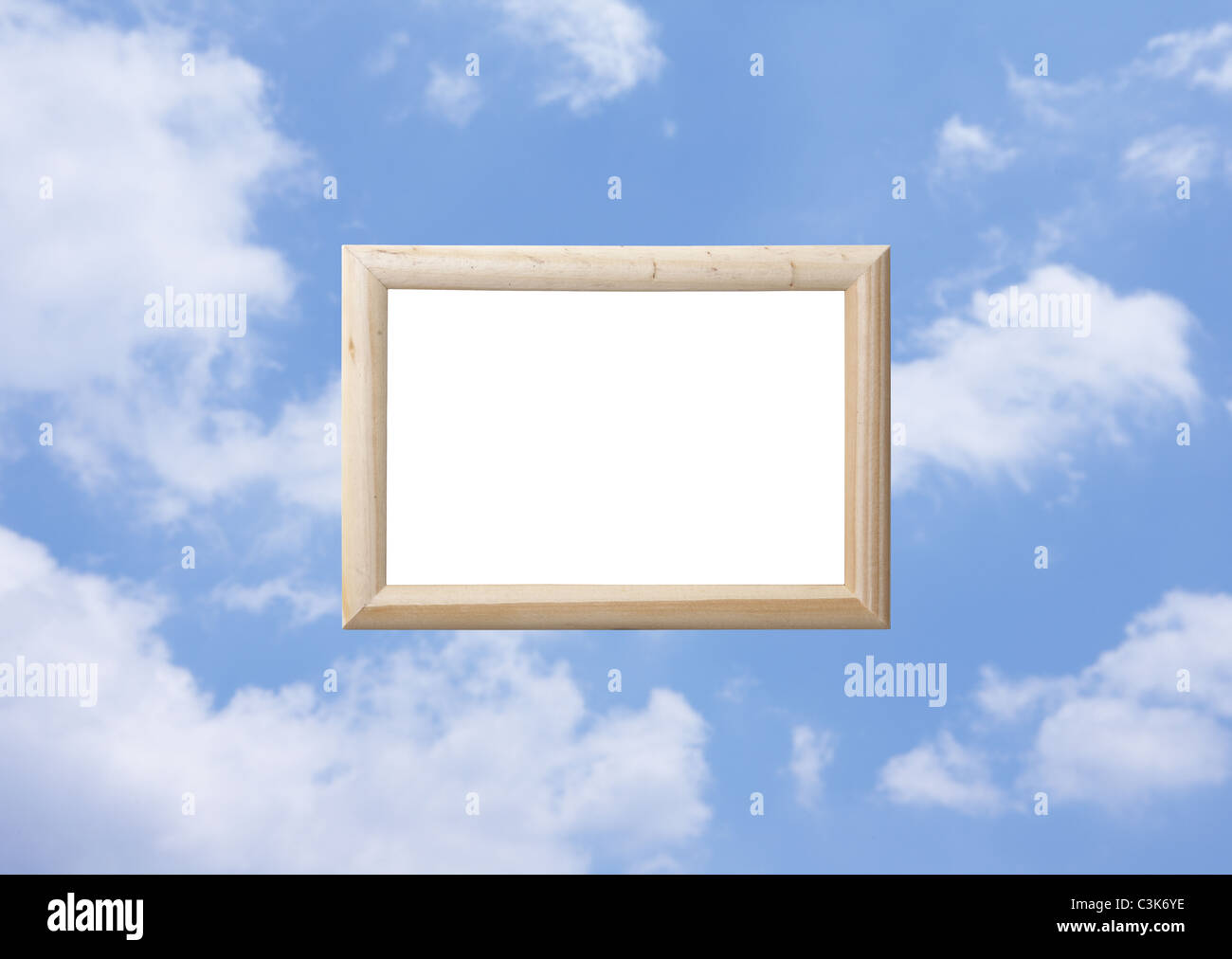 Frame floating in blue sky Stock Photo - Alamy