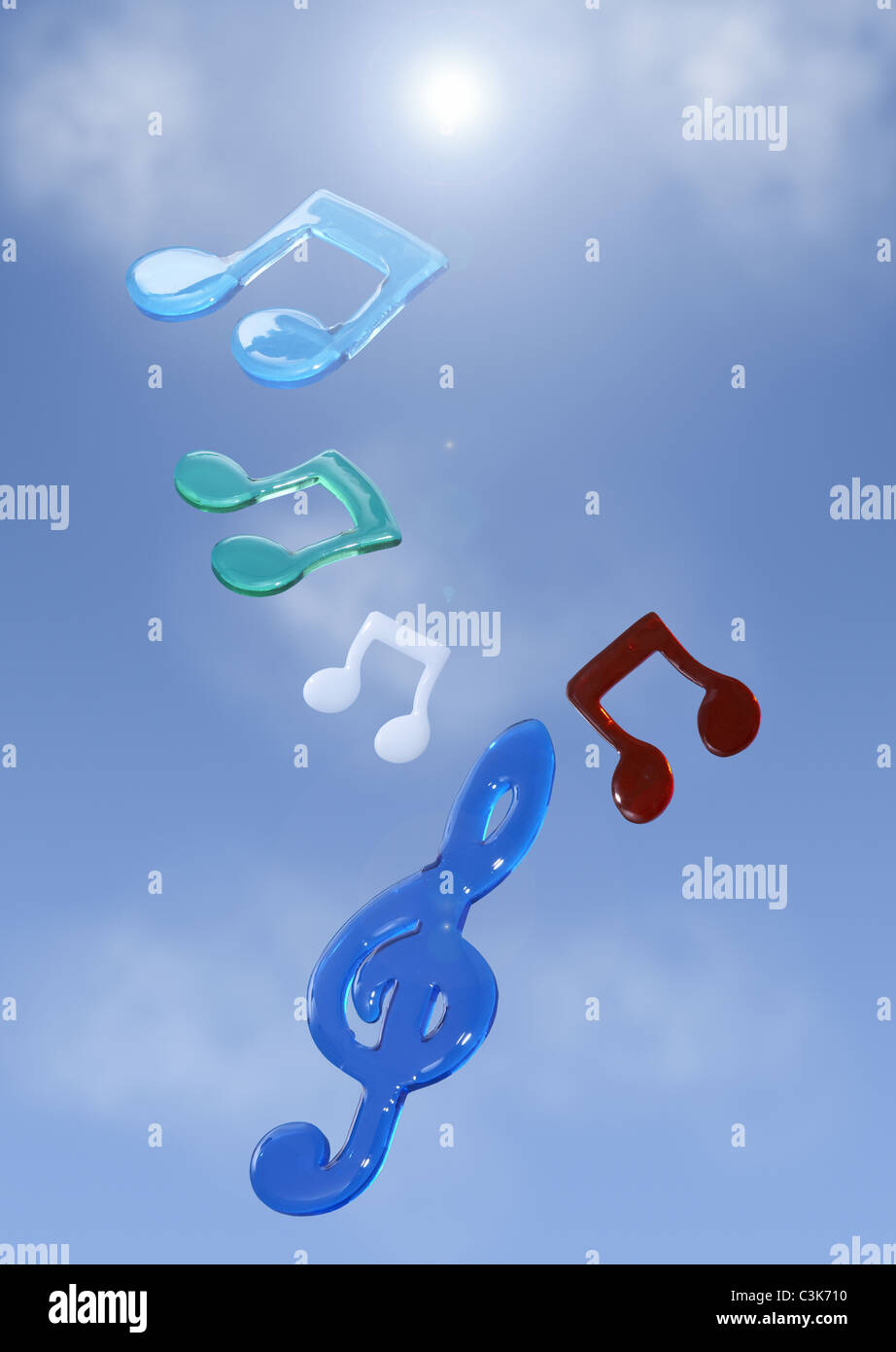 Musical notes floating in blue sky Stock Photo - Alamy