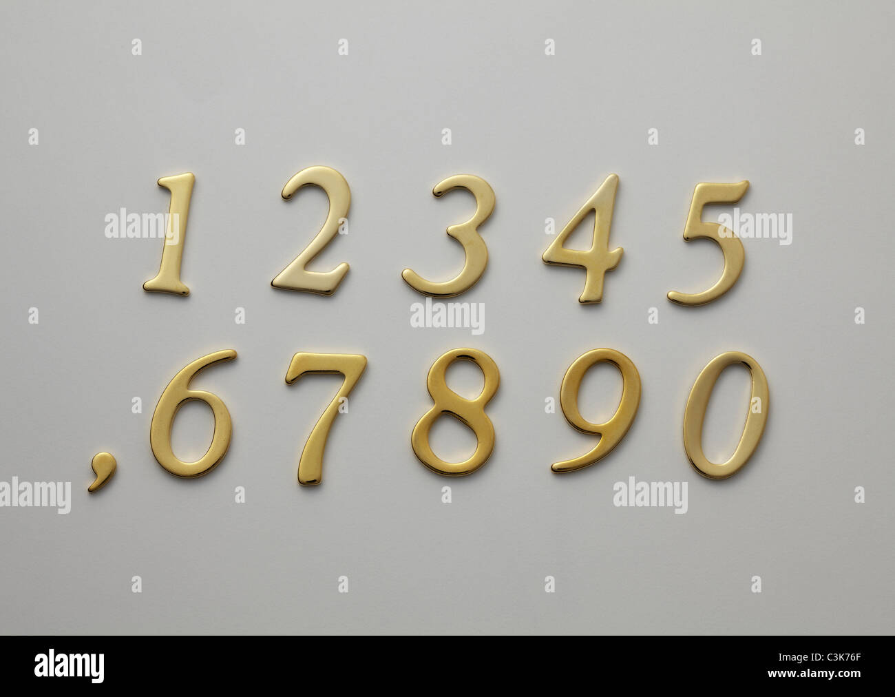 Row number shaped plates Stock Photo - Alamy