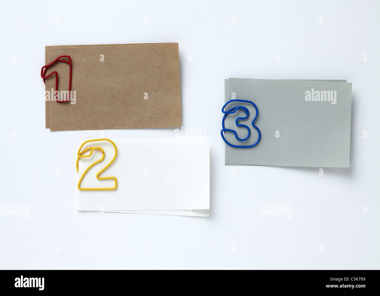 Number shaped clips and memo pads Stock Photo - Alamy