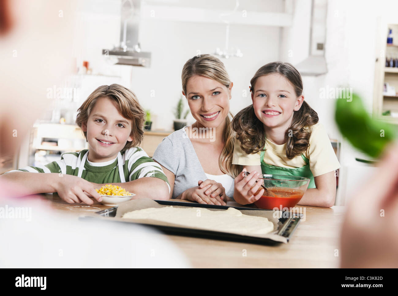 Mother daughter making dough pizza hi-res stock photography and images ...