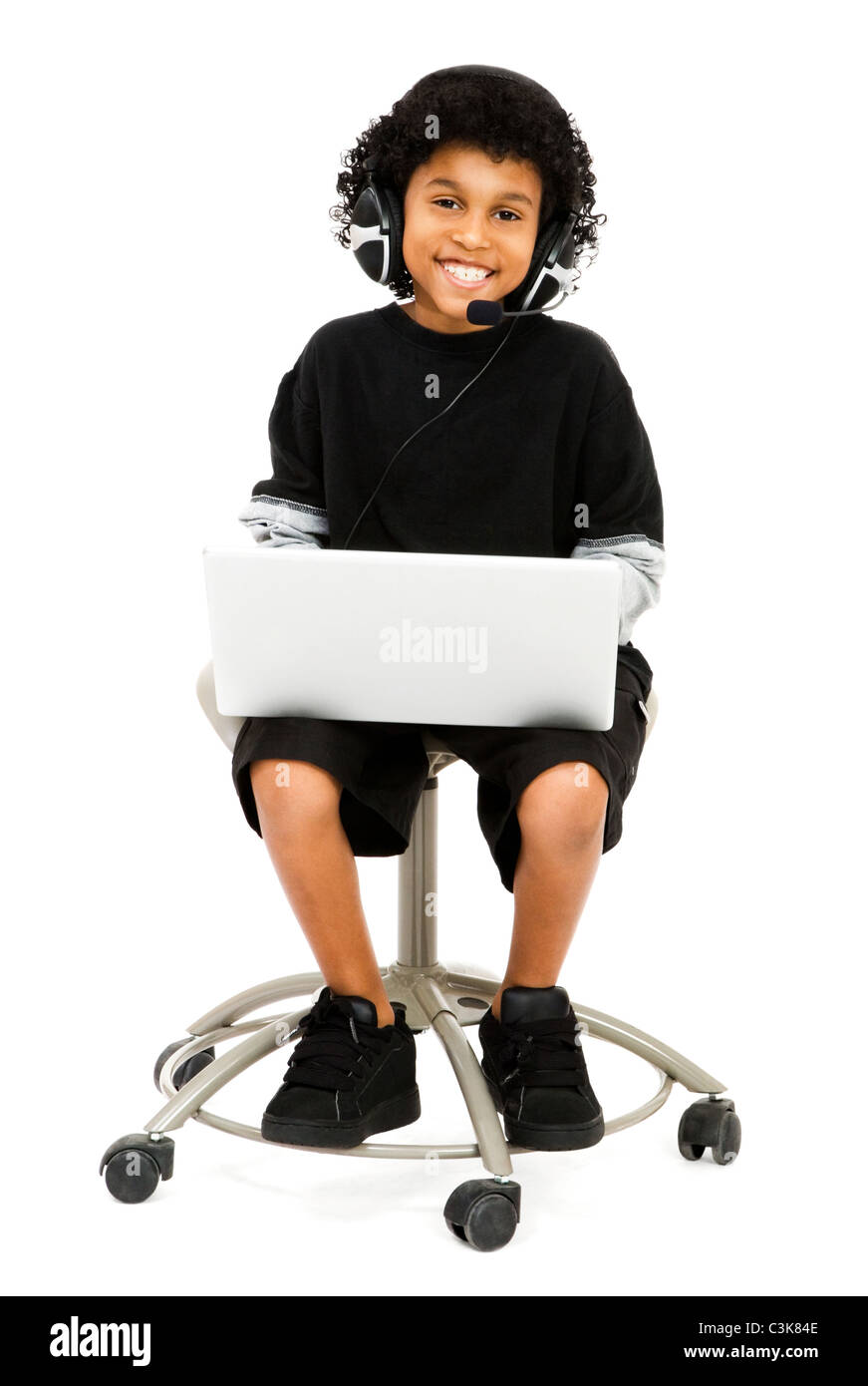 Boy using computer learning Cut Out Stock Images & Pictures - Alamy