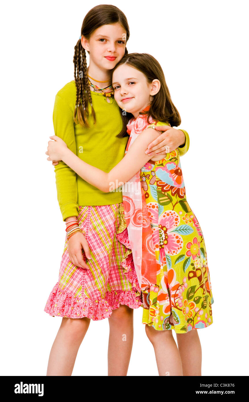 Two sister hugging eachother hi-res stock photography and images - Alamy