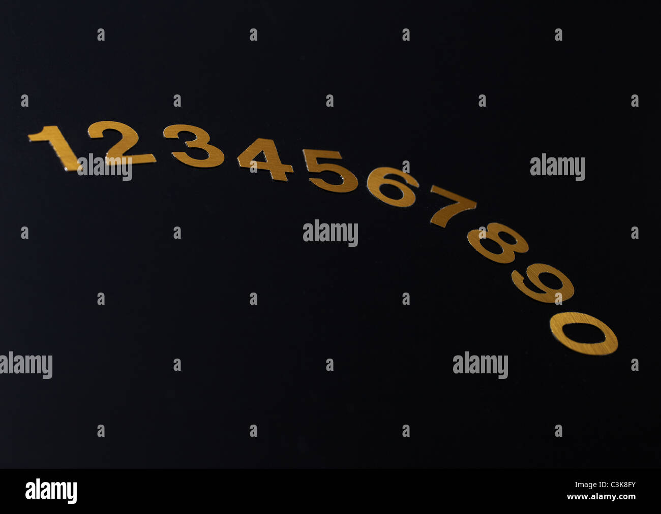 Row number shaped plates Stock Photo - Alamy