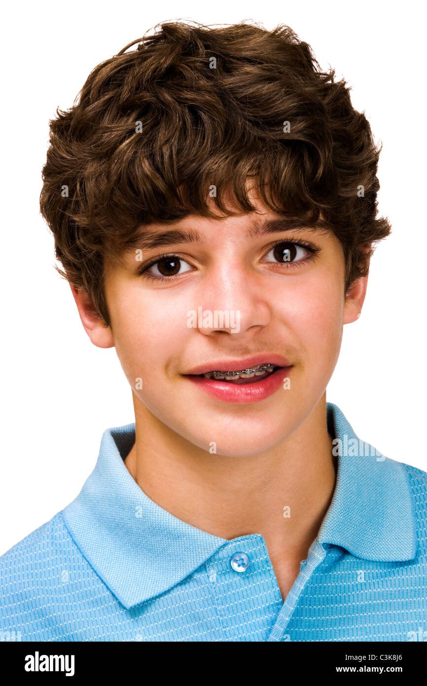 Boy posing and smiling isolated over white Stock Photo - Alamy