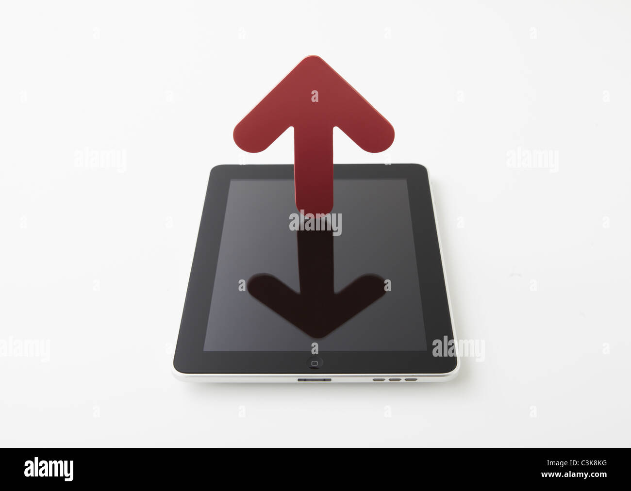 Tablet PC and arrow Stock Photo - Alamy